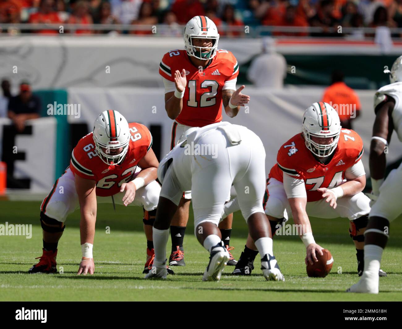 Miami quarterback Malik Rosier (12) watts for the snap during the first ...