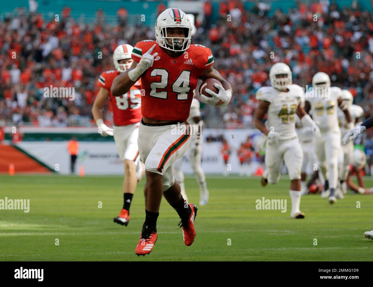 Miami running back Travis Homer (24) runs on his way to scoring a ...