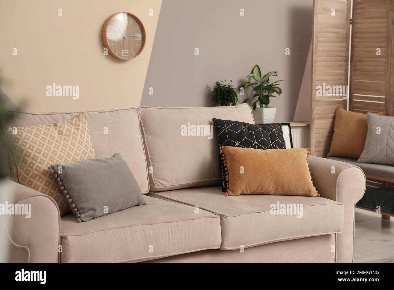 Modern comfortable sofa with pillows indoors. Stylish room interior ...