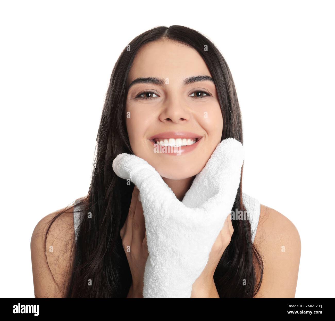 Young woman wiping face with towel on white background Stock Photo - Alamy
