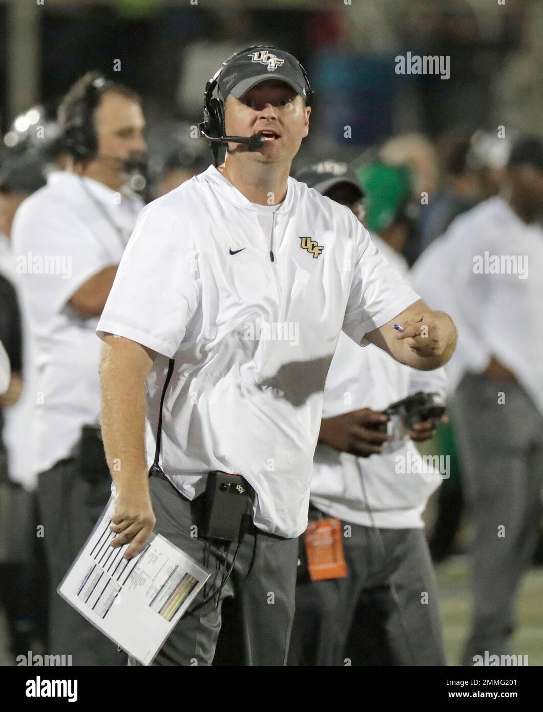 Central Florida head coach Josh Heupel directs his team against Florida ...