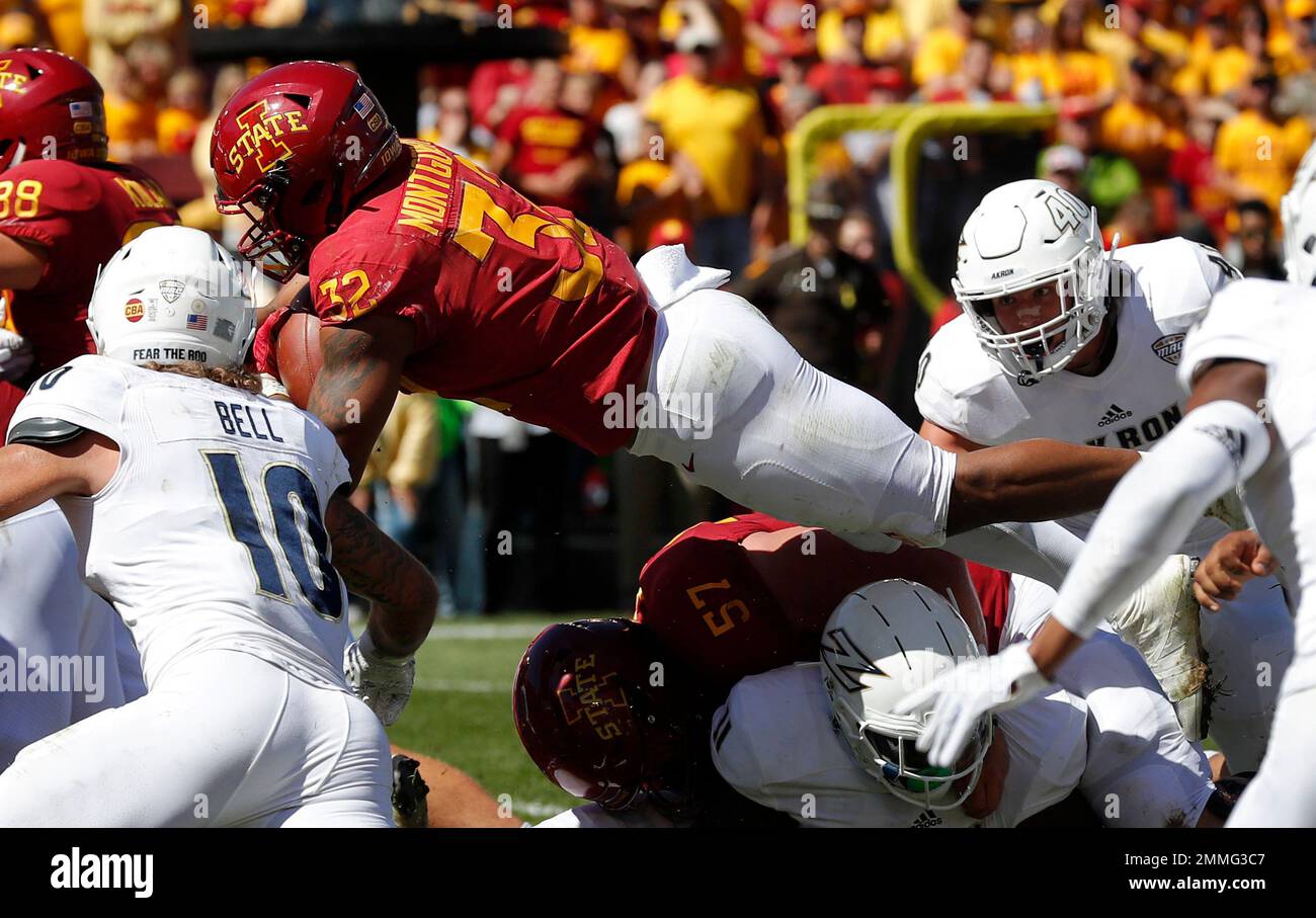 Iowa State running back David Montgomery (32) dives over Akron ...