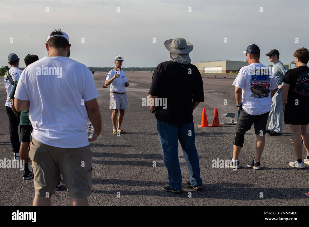 A Sports Car Club of America (SCCA) volunteer gives a safety brief to ...