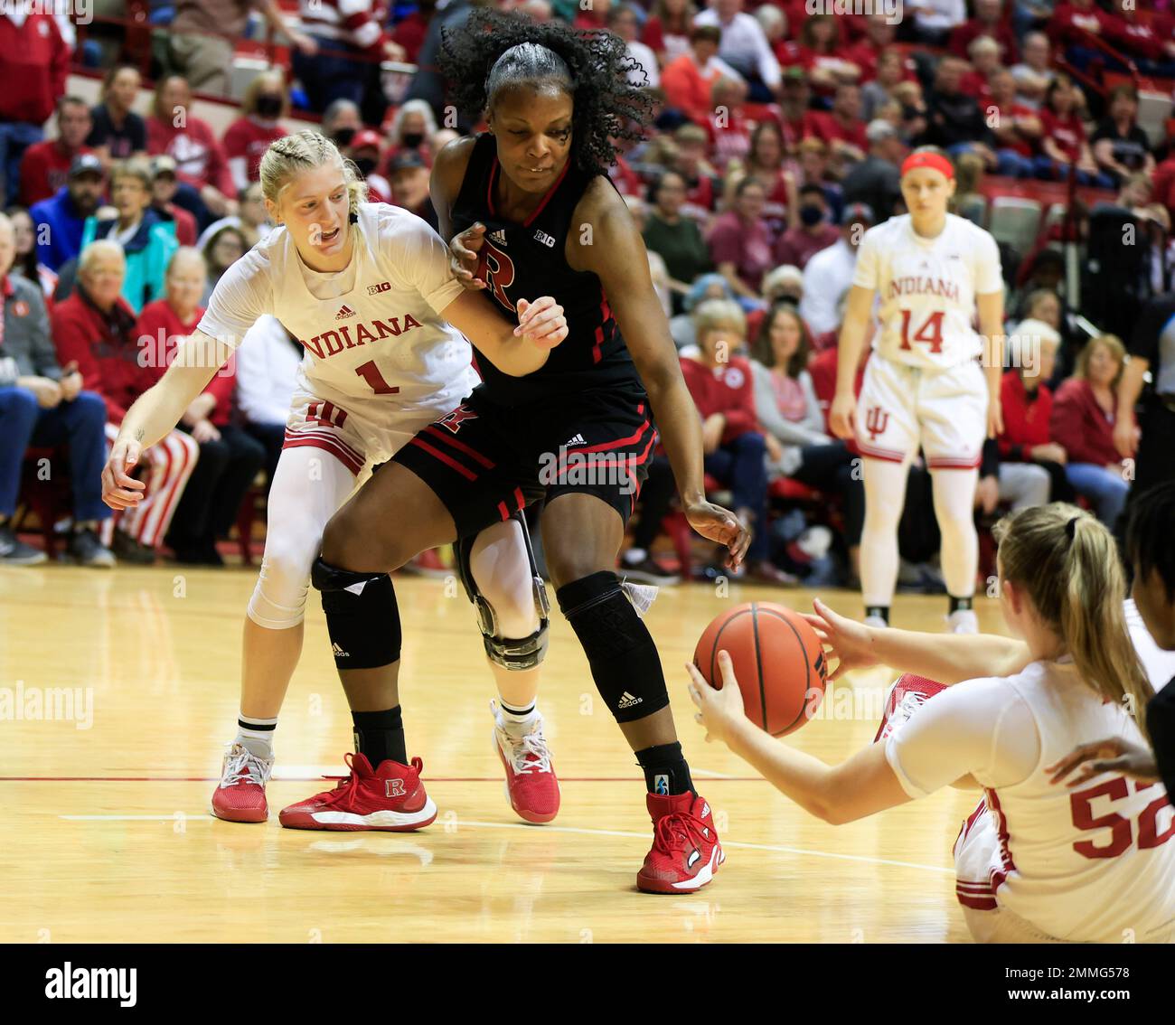 Indiana Hoosiers forward Lilly Meister (52) passes to Indiana Hoosiers ...