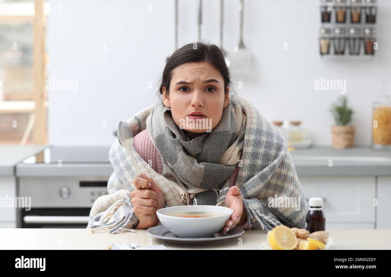 Woman eating food sick hi-res stock photography and images - Alamy