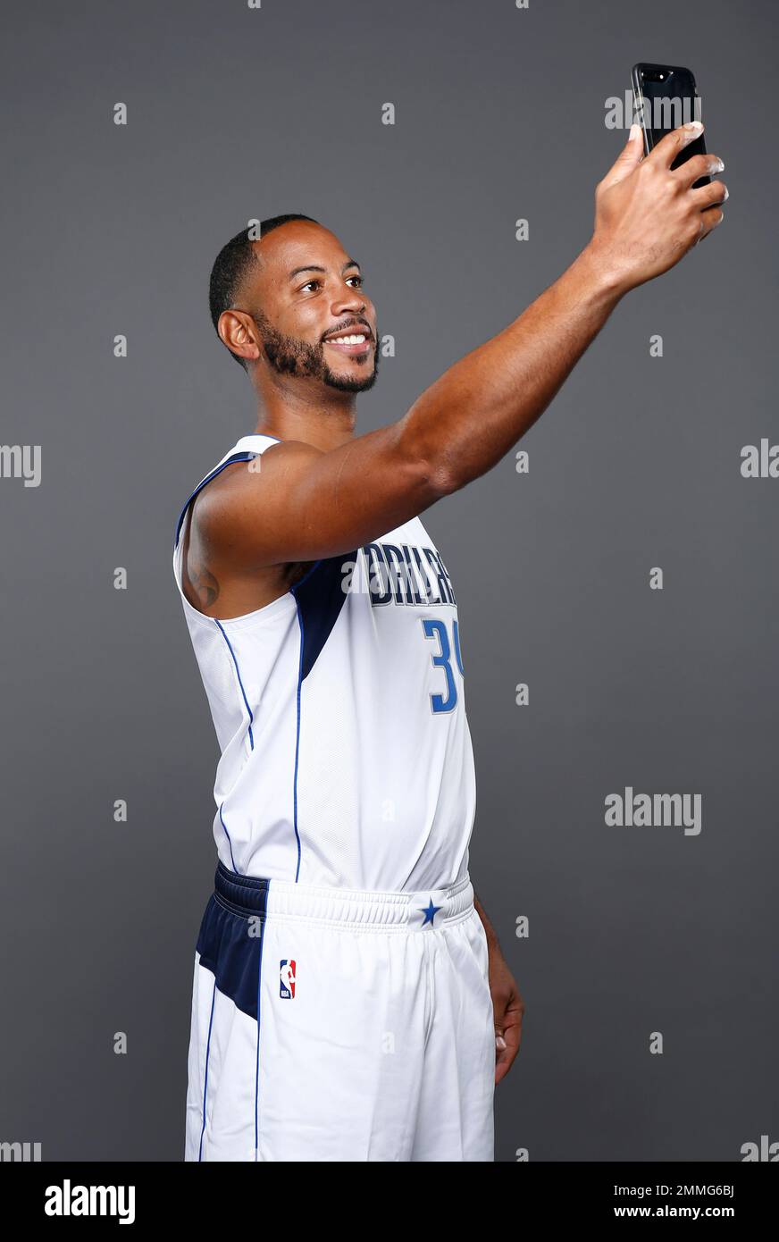 Dallas Mavericks guard Devin Harris (34) poses for a photo during the ...