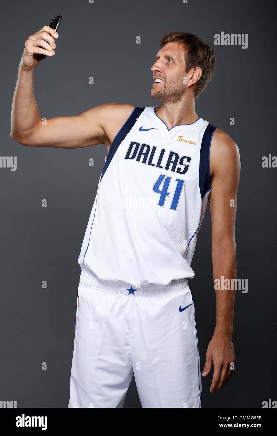 Dallas Mavericks center Dirk Nowitzki (41), of Germany, poses for a ...