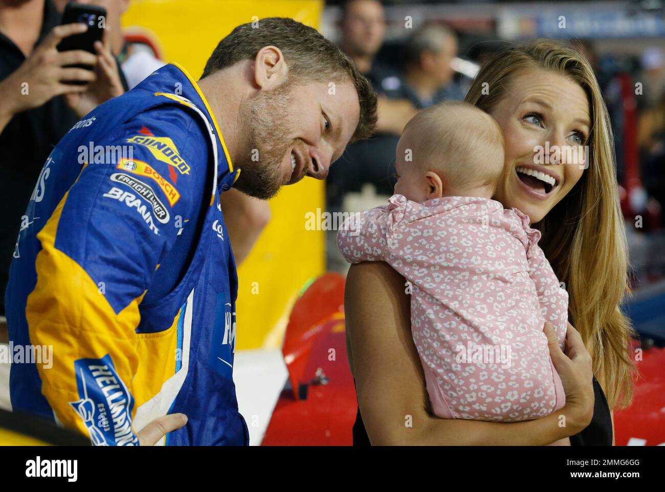 Dale Earnhardt Jr., left, looks at his daughter, Isla, and his wife Amy ...