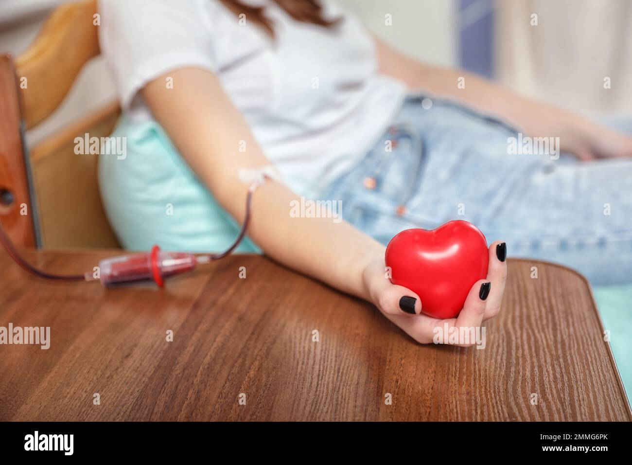 Teenager donating blood in hospital, closeup view Stock Photo - Alamy
