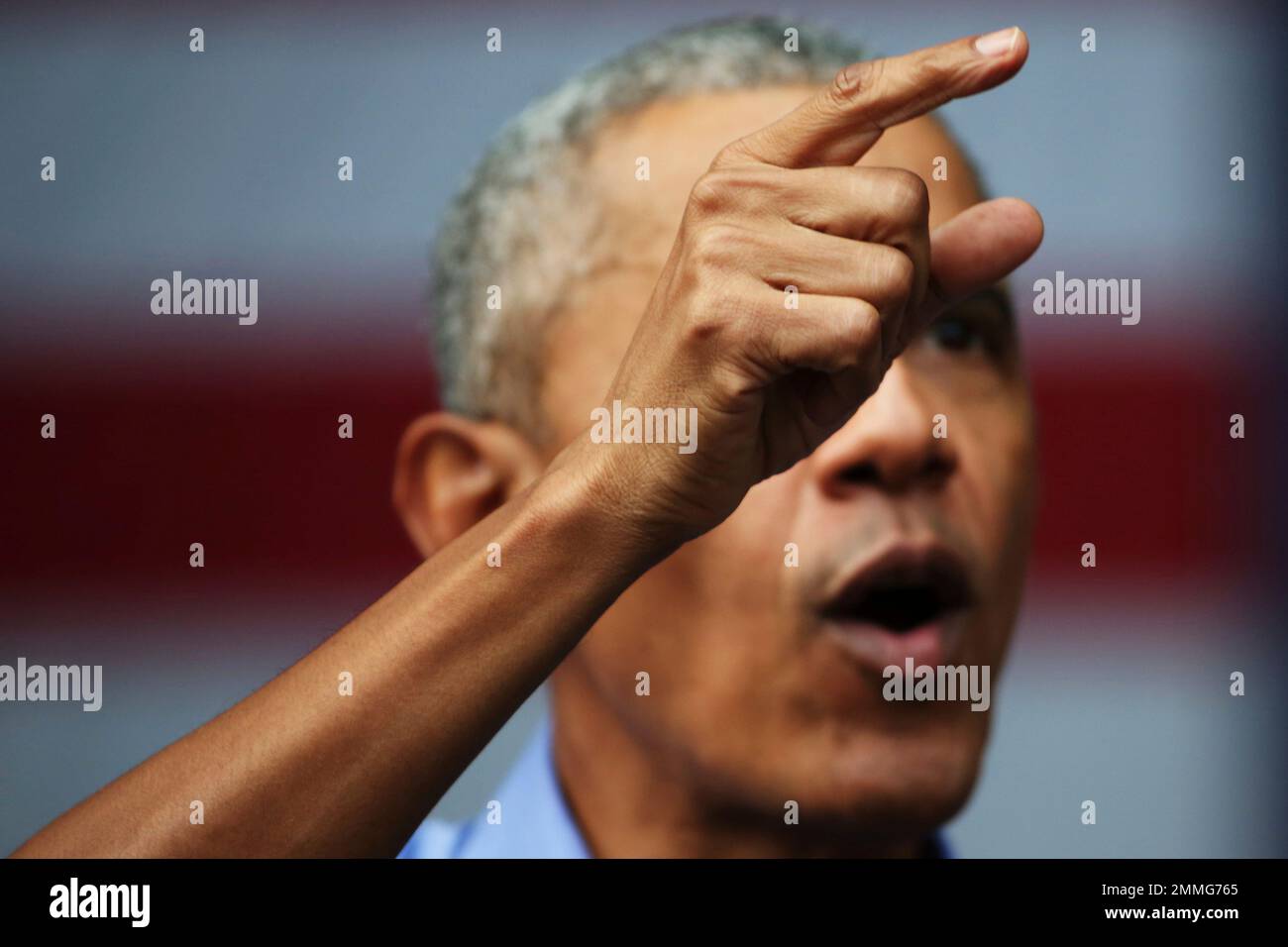 Former President Barack Obama gestures as he campaigns in support of ...