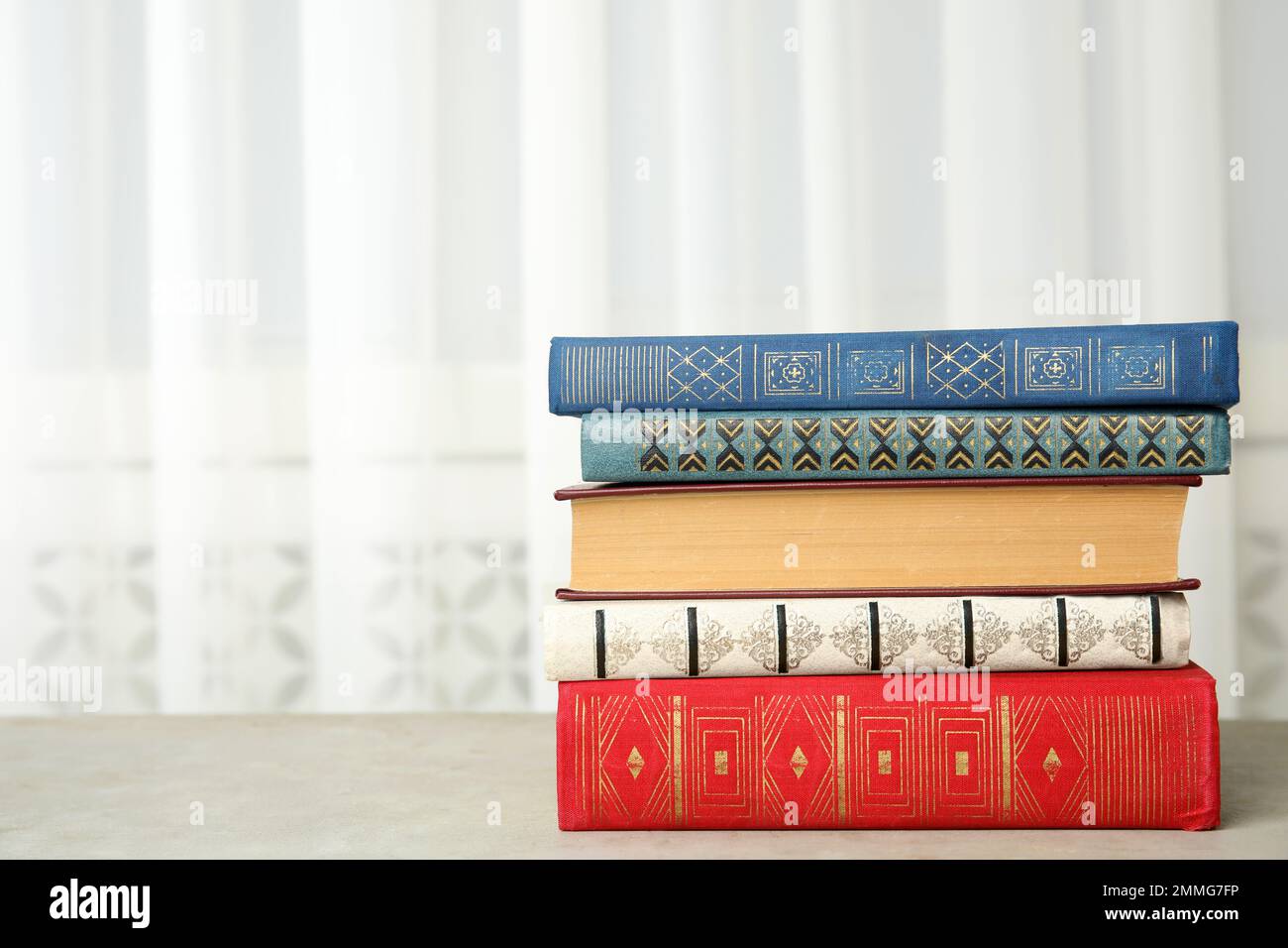 Collection of different books on table indoors. Space for text Stock ...