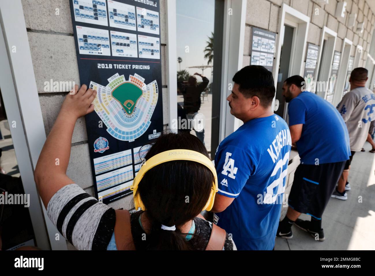 Los Angeles Dodgers baseball fan Jessica Aguila, left and Eddie Rocha ...
