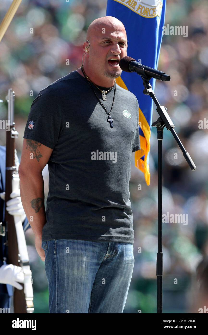 Billy Joel band member Mike DelGuidice sings the National Anthem before ...