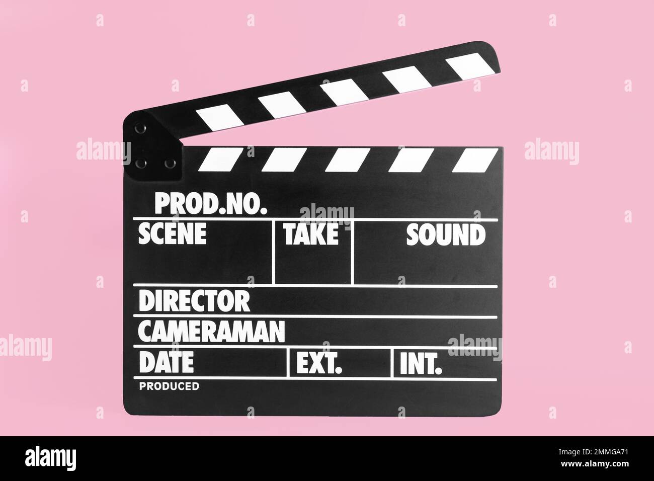 Clapper board on pink background. Cinema production Stock Photo - Alamy