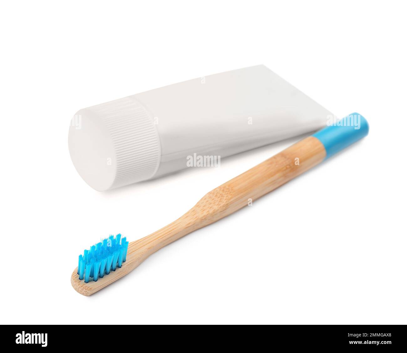 Toothbrush toothpaste on wooden Cut Out Stock Images & Pictures - Alamy
