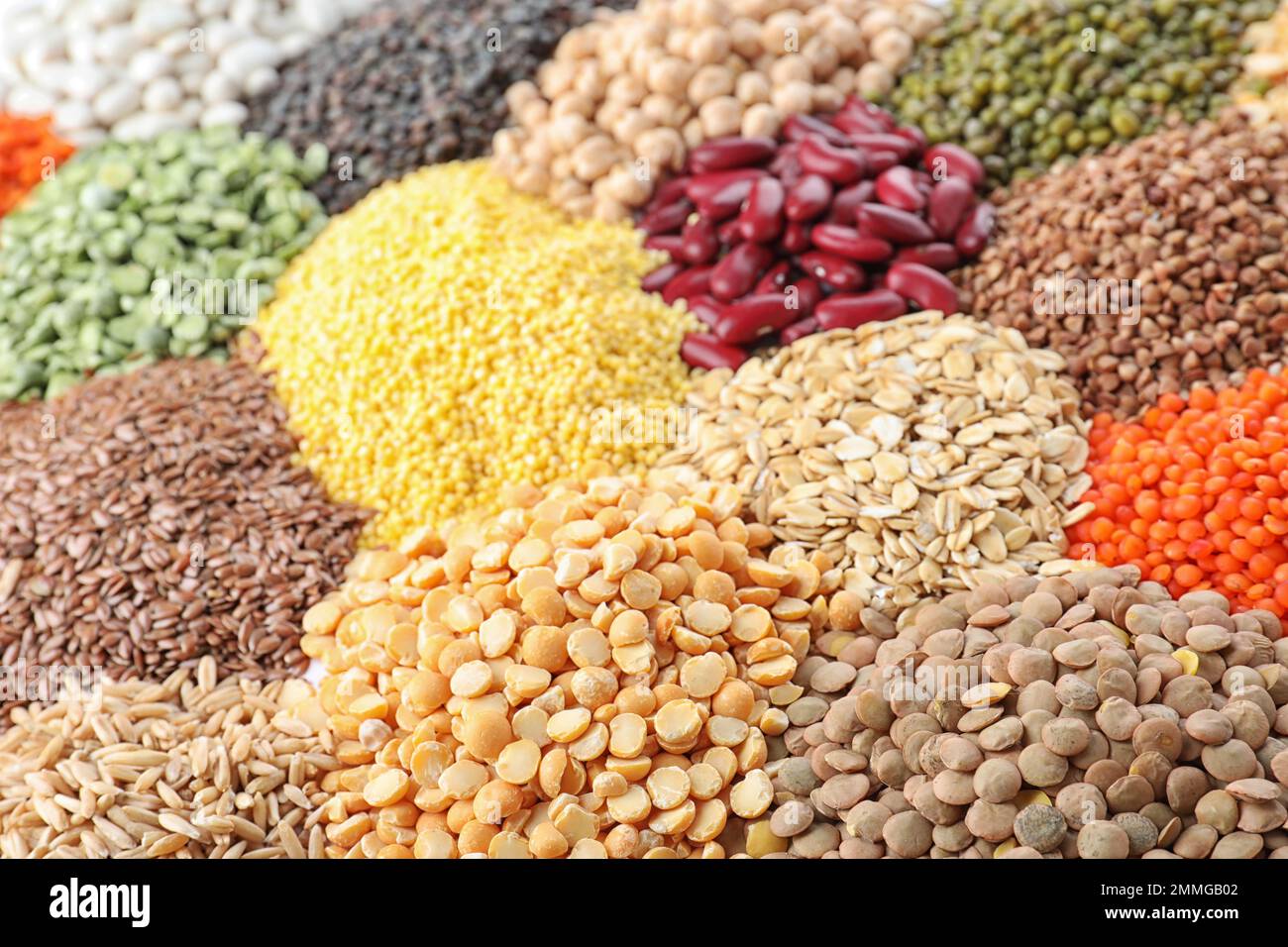 Different types of legumes and cereals as background, closeup. Organic ...