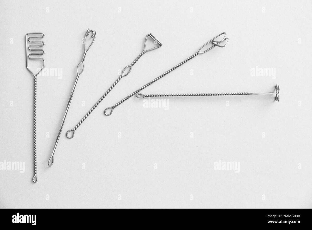 Set of logopedic probes for speech therapy on light grey background ...