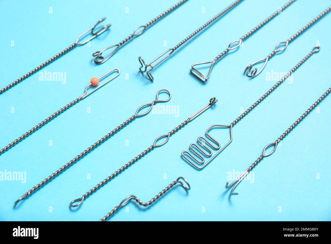 Set of logopedic probes for speech therapy on light blue background ...