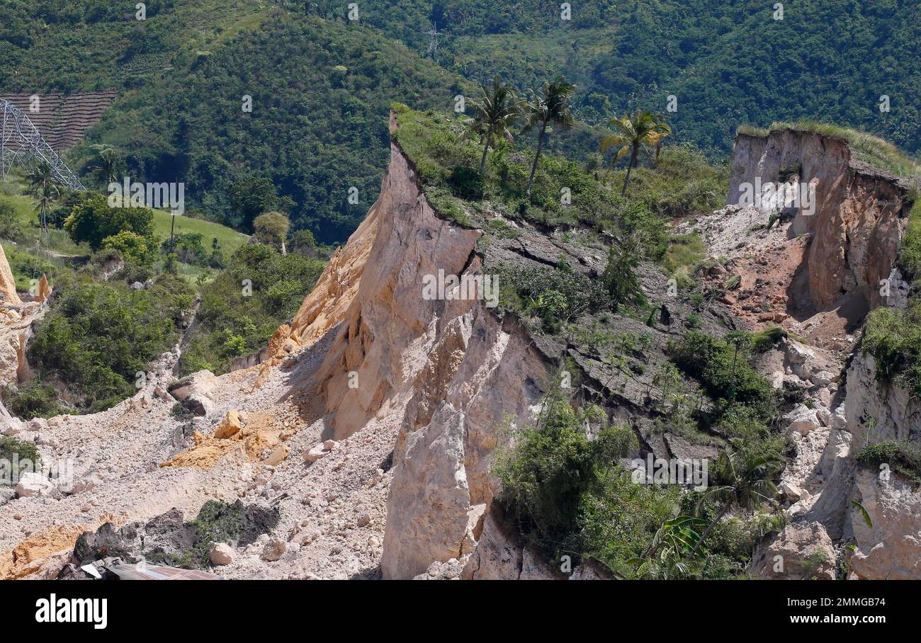 The extent of a massive landslide is seen in Naga, central Philippines ...