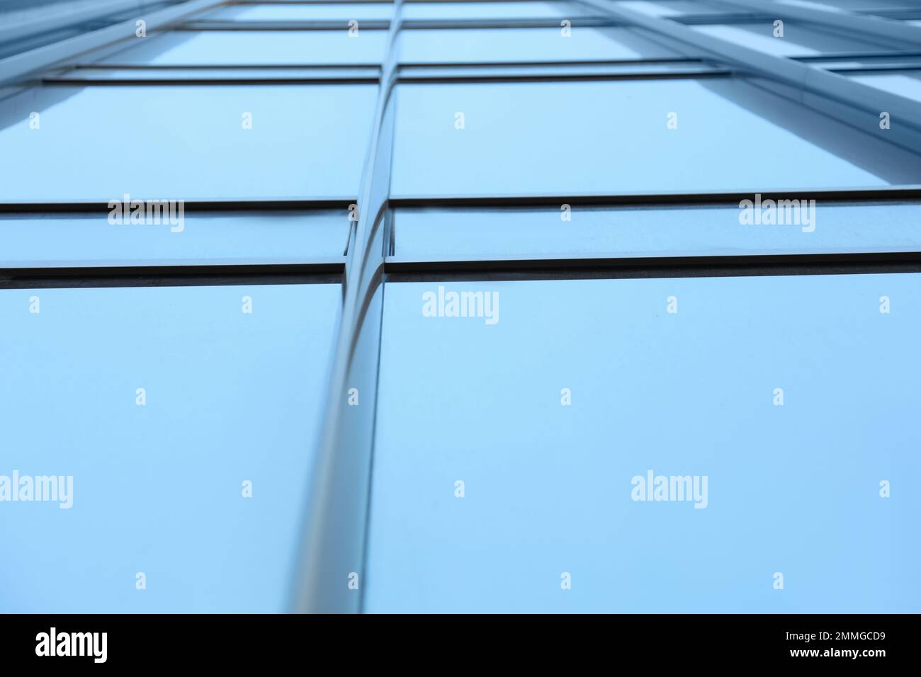 Modern building with tinted windows, low angle view Stock Photo - Alamy