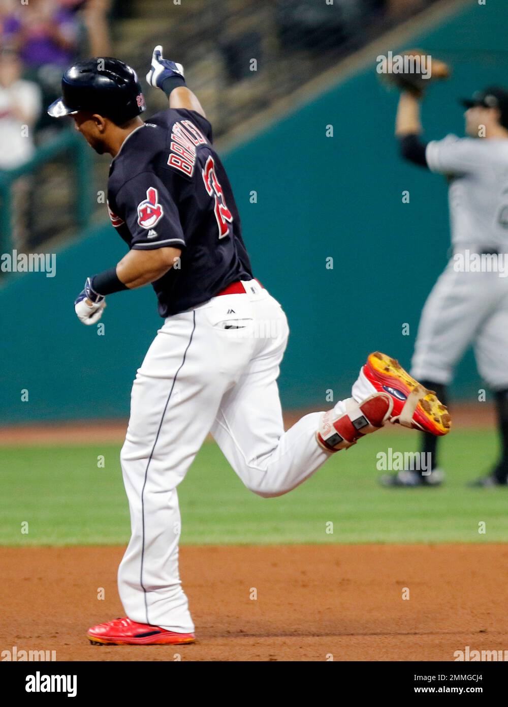 Cleveland Indians' Michael Brantley celebrates as he rounds the bases ...
