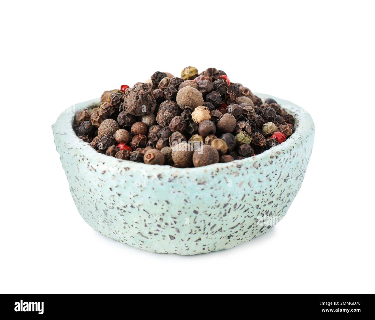 Peppers mix in bowl isolated on white Stock Photo - Alamy