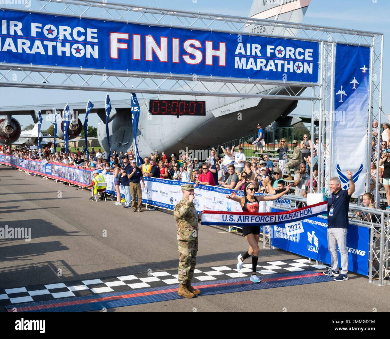 Gabby Bobadilla crosses the finish line of 2022 Air Force Marathon at ...