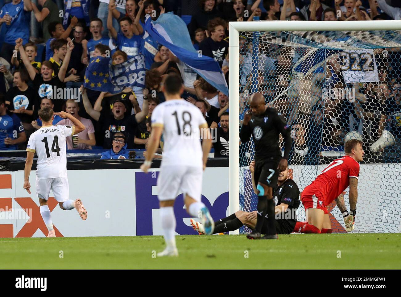 Genk's Leandro Trossard, left, jubilates after scoring his sides first ...