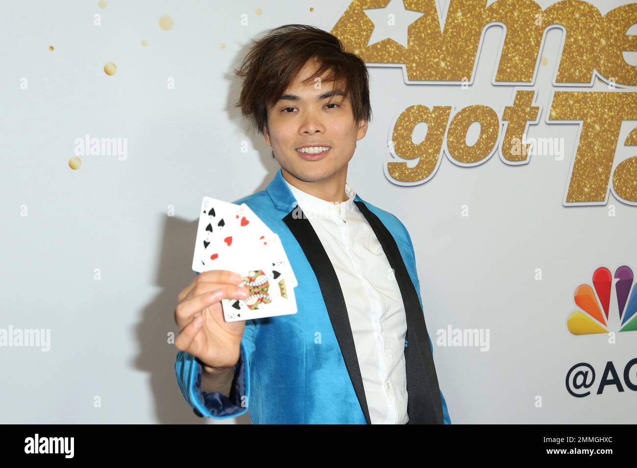 AGT's winner magician Shin Lim shows his cards as he arrives at the ...