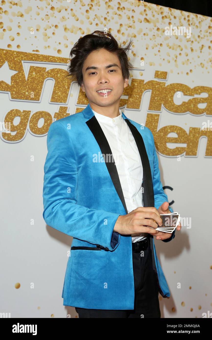 AGT's winner magician Shin Lim shows his cards as he arrives at the ...