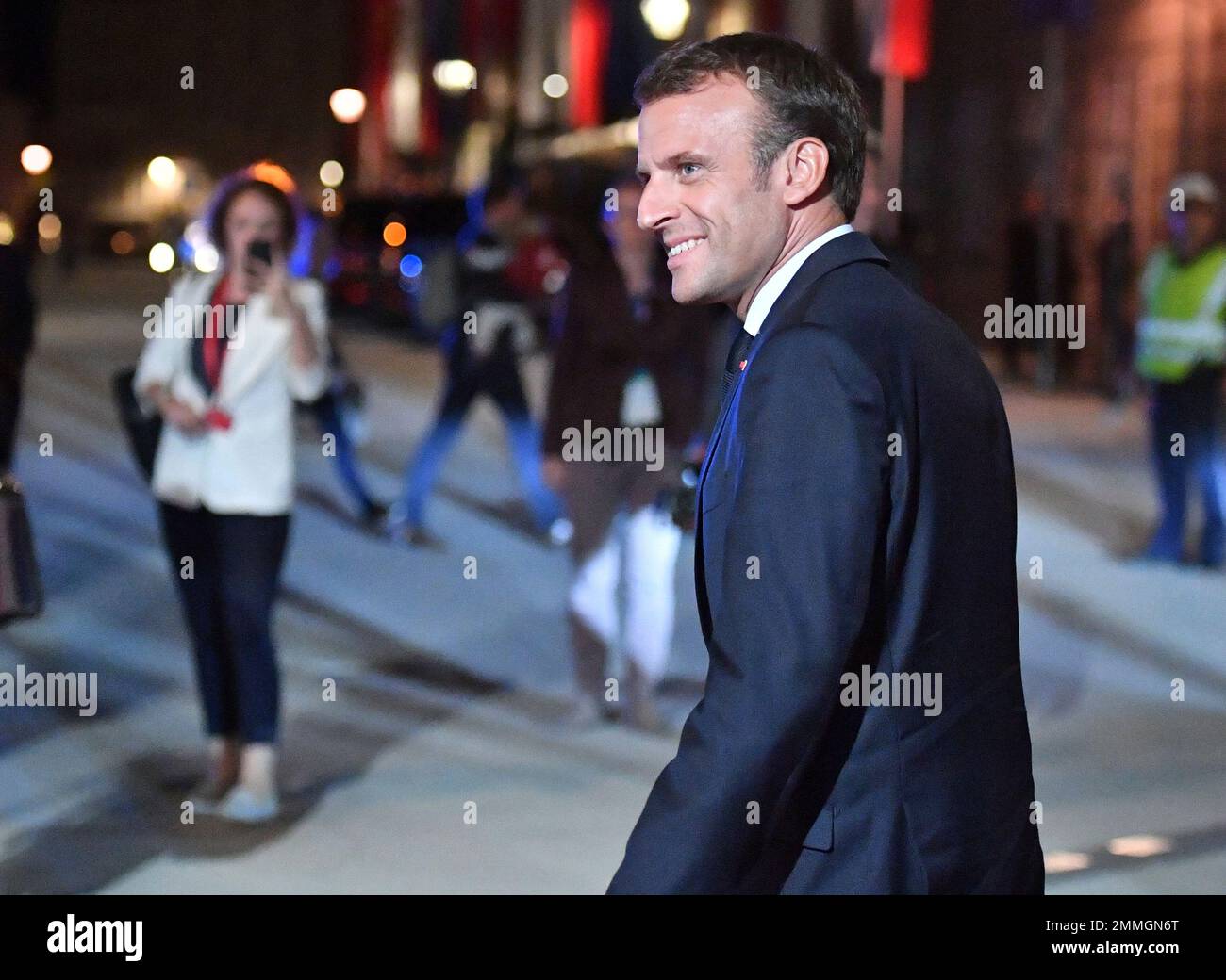 French President Emmanuel Macron smiles when arriving at the informal ...