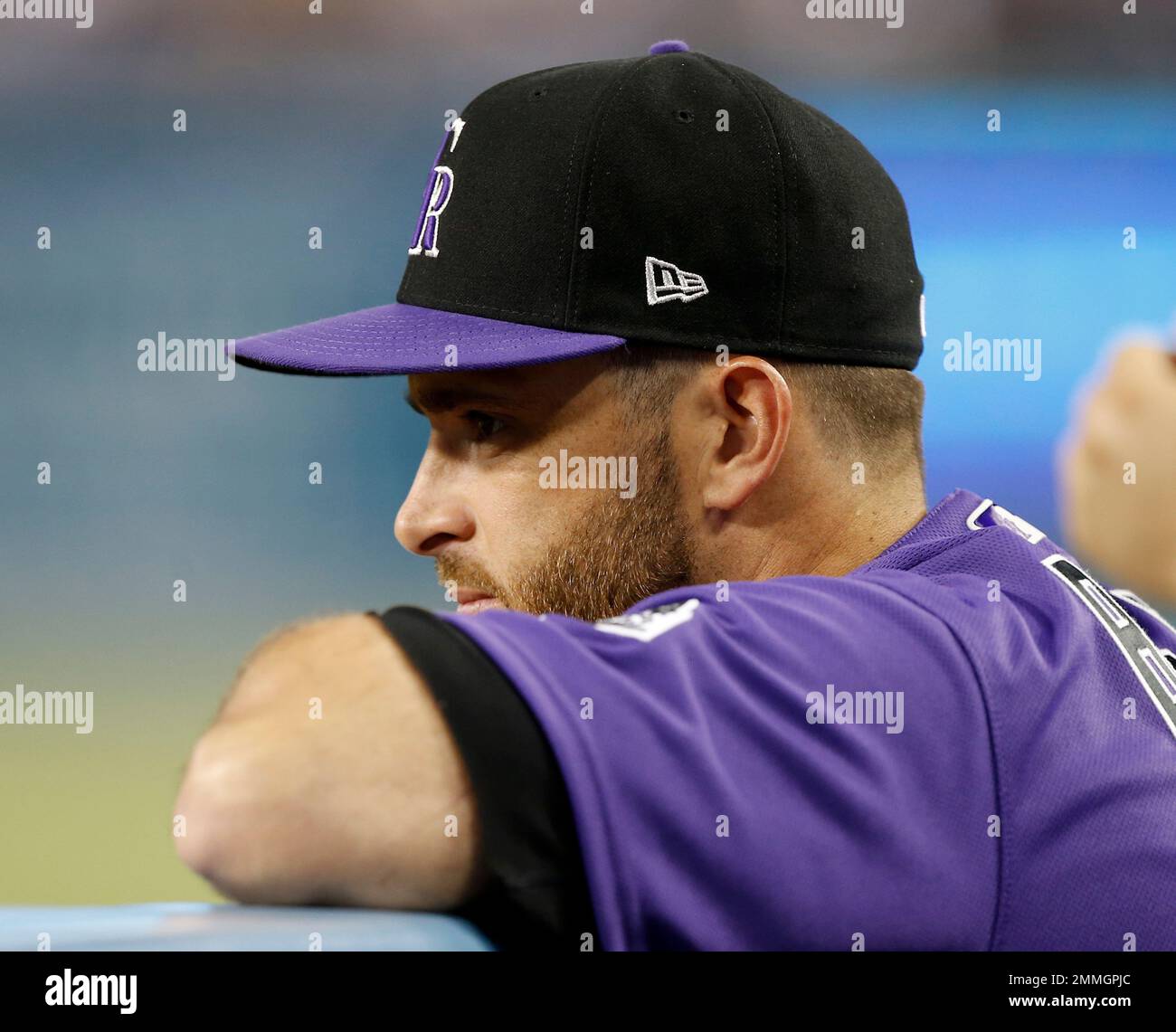 Colorado Rockies catcher Drew Butera looks over the field before a ...