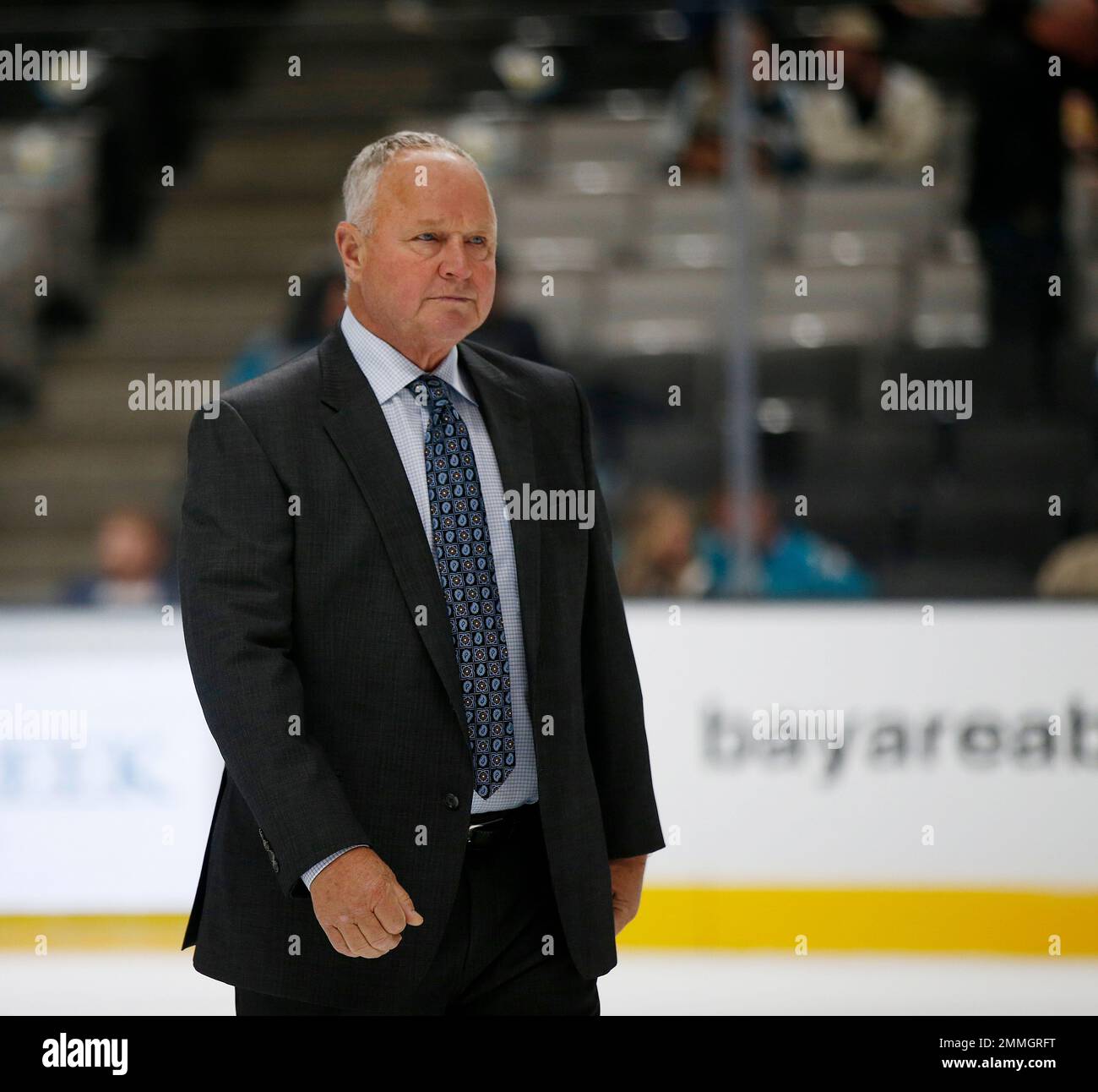 Anaheim Ducks coach Randy Carlyle leaves the ice after the first period ...