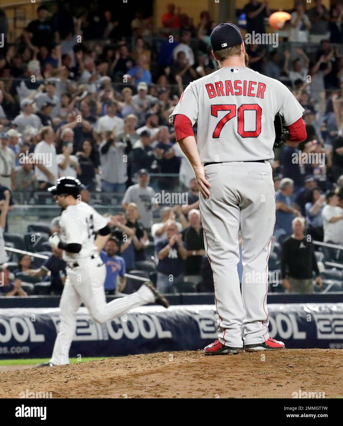 Boston Red Sox relief pitcher Ryan Brasier (70) reacts as New York ...