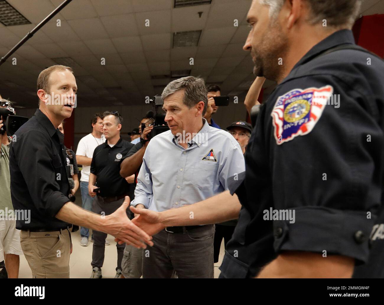 FEMA Administrator Brock Long, left, and North Carolina Gov. Roy Cooper ...
