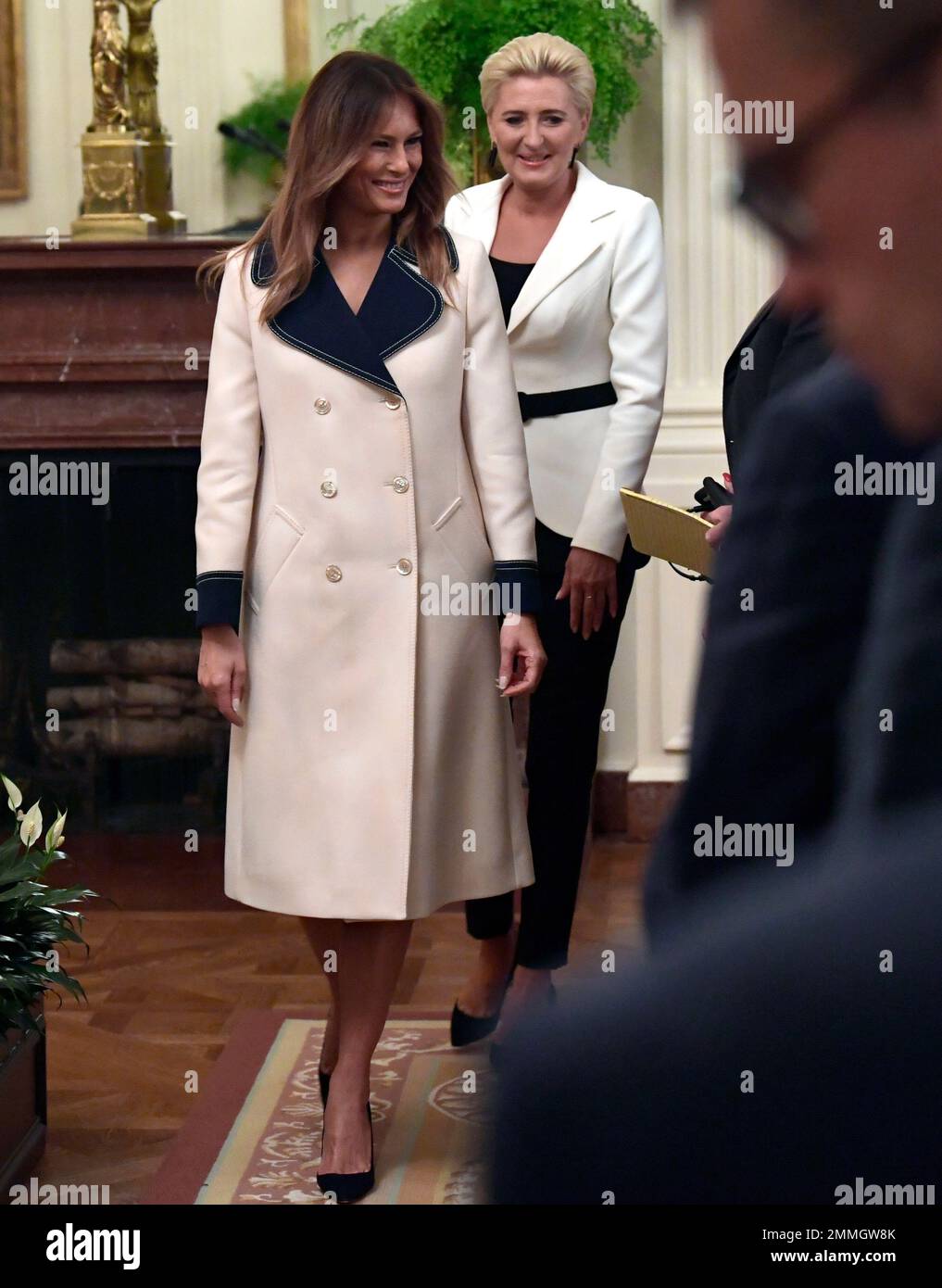 First lady Melania Trump, left, and Polish first lady Agata Kornhauser ...