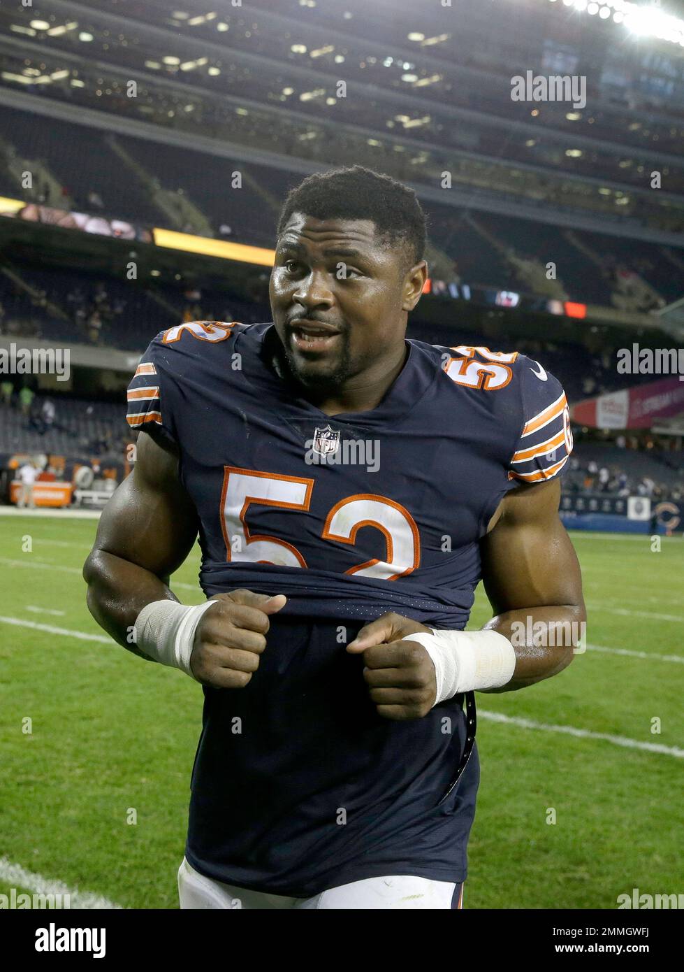 Chicago Bears linebacker Khalil Mack (52) walks off the field after an ...