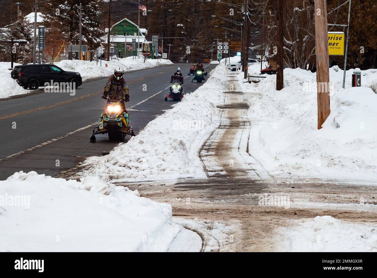 Village road snowmobile tracks hi-res stock photography and images - Alamy