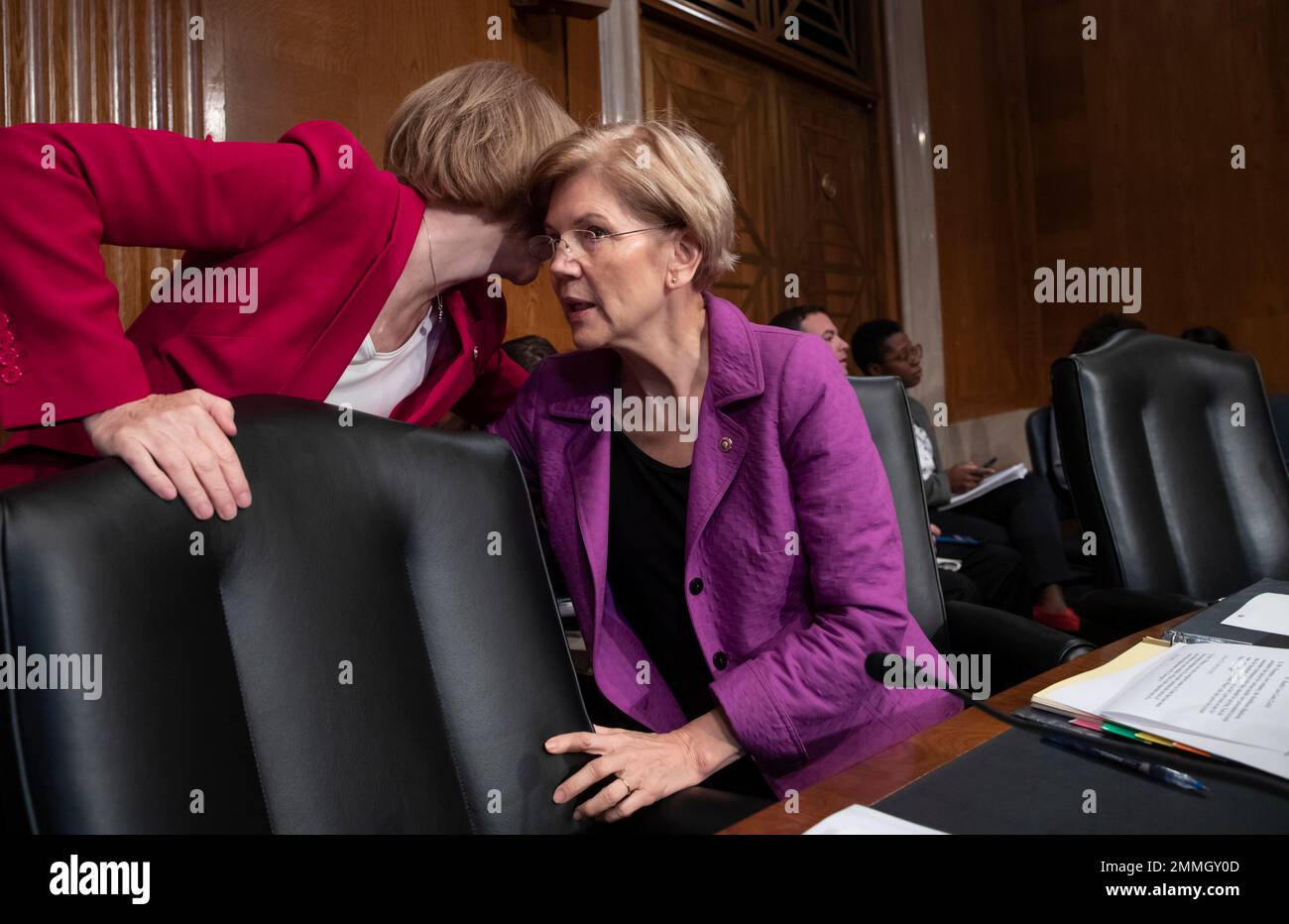 Sen. Tina Smith, D-Minn., left, speaks with Sen. Elizabeth Warren, D ...