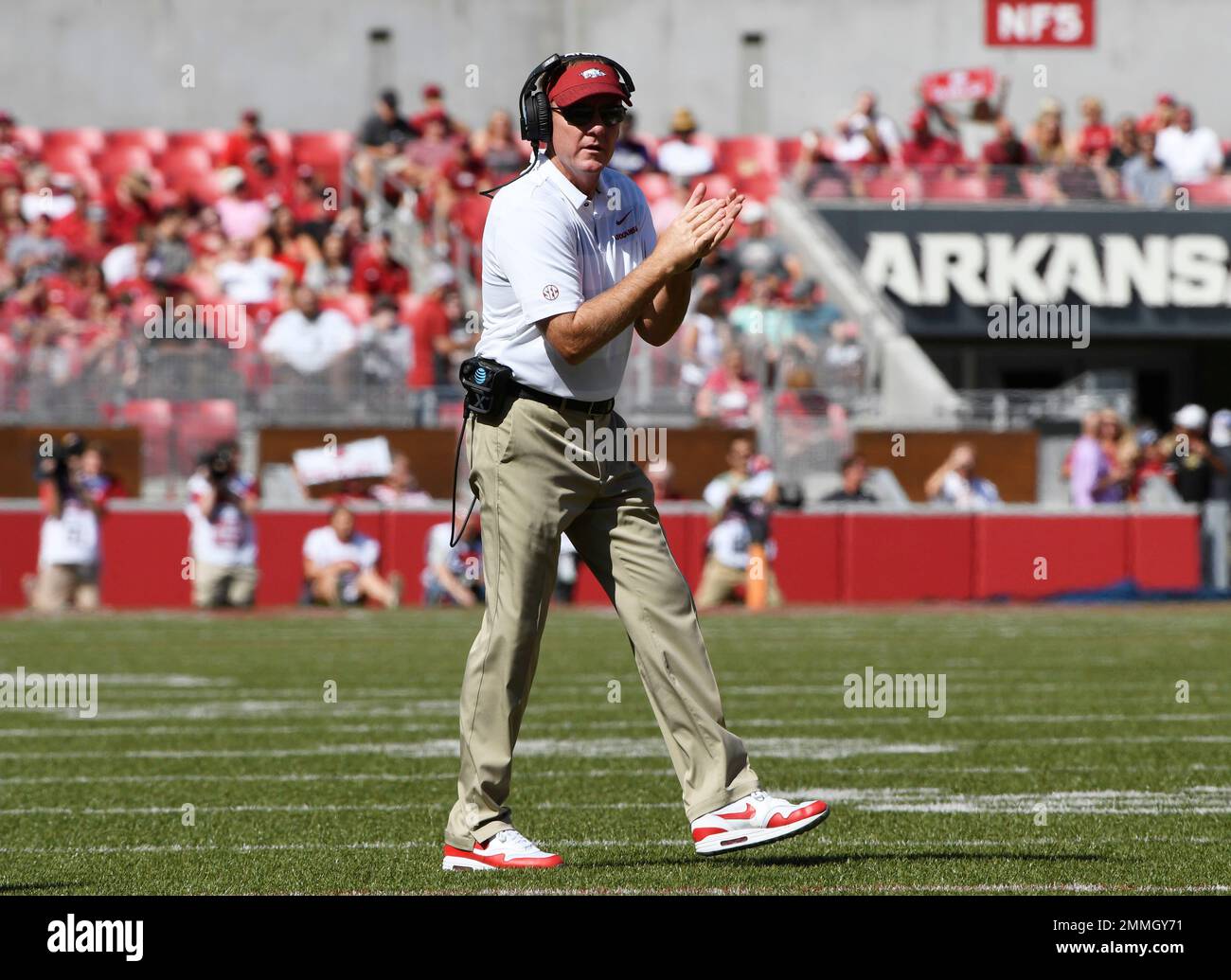 Arkansas coach Chad Morris talks to his team as they play North Texas ...