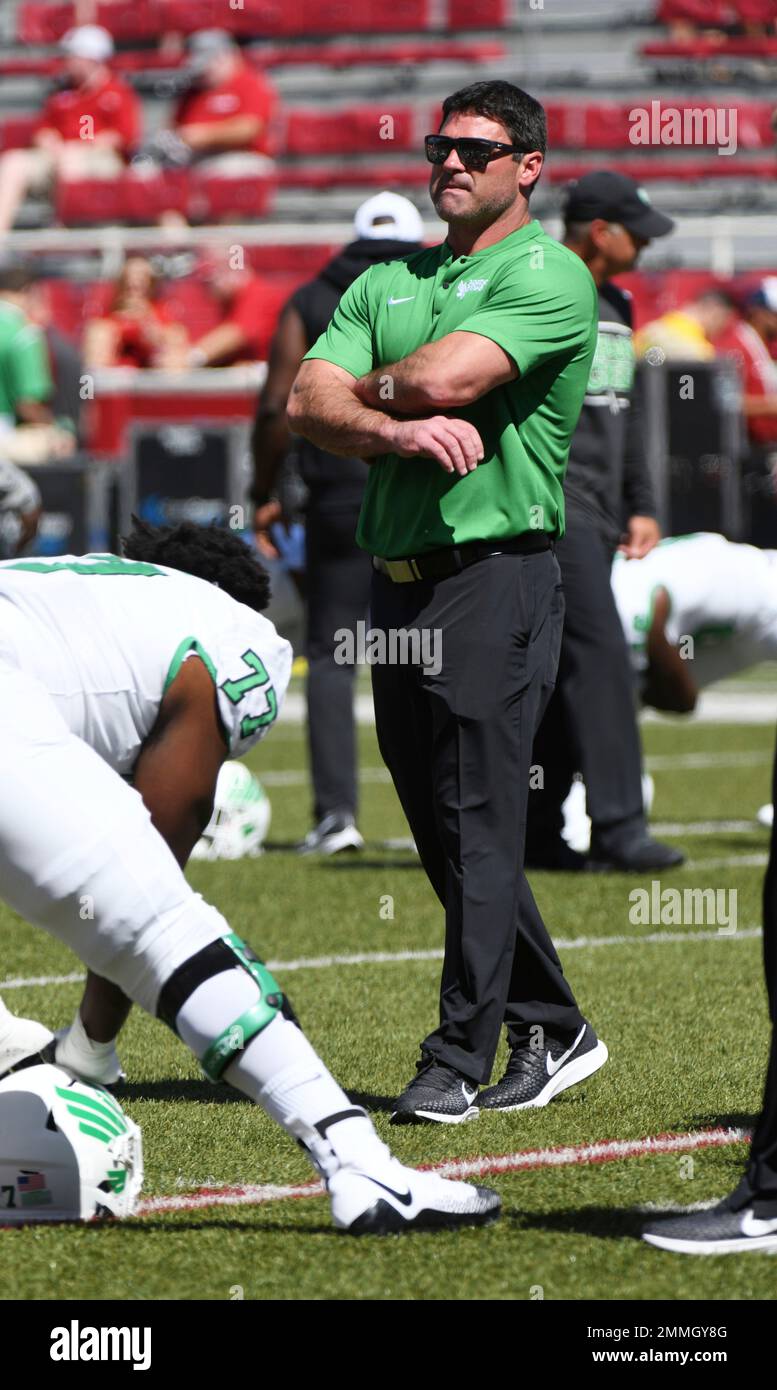 North Texas coach Seth Littrell watches his team warm up before playing ...