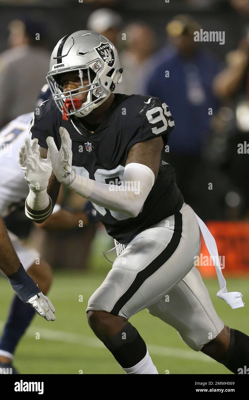 Oakland Raiders defensive end Arden Key rushes the quarterback during ...