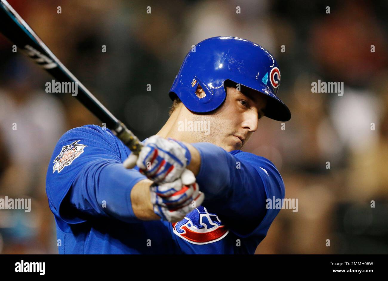 Chicago Cubs' Anthony Rizzo takes a practice swing as he waits to bat ...