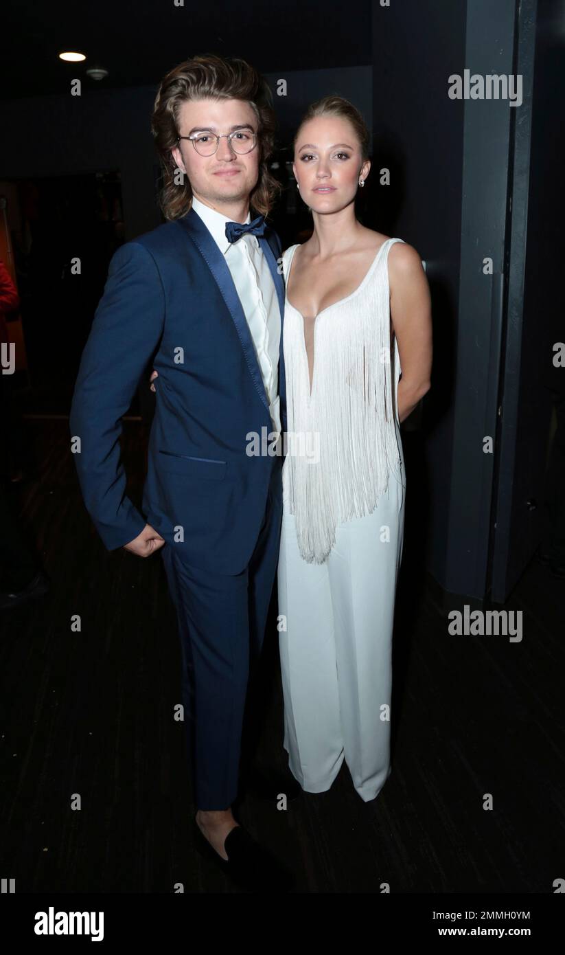 Joe Keery, left, and Maika Monroe at the 70th Primetime Emmy Awards on ...