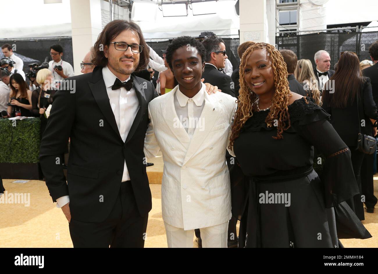 Dan Cohen, from left, Caleb McLaughlin and April Mclaughlin arrive at ...