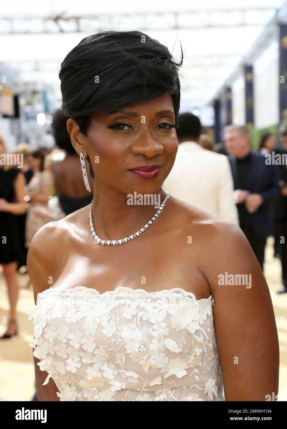 Elisa Perry arrives at the 70th Primetime Emmy Awards on Monday, Sept ...