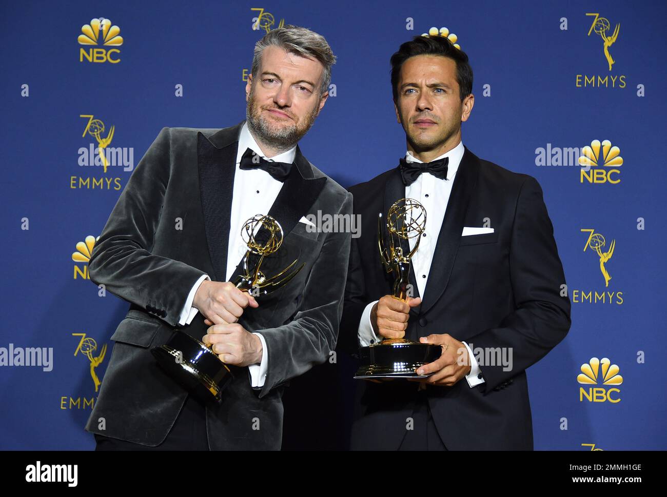 Charlie Brooker, left, and William Bridges pose backstage with the ...