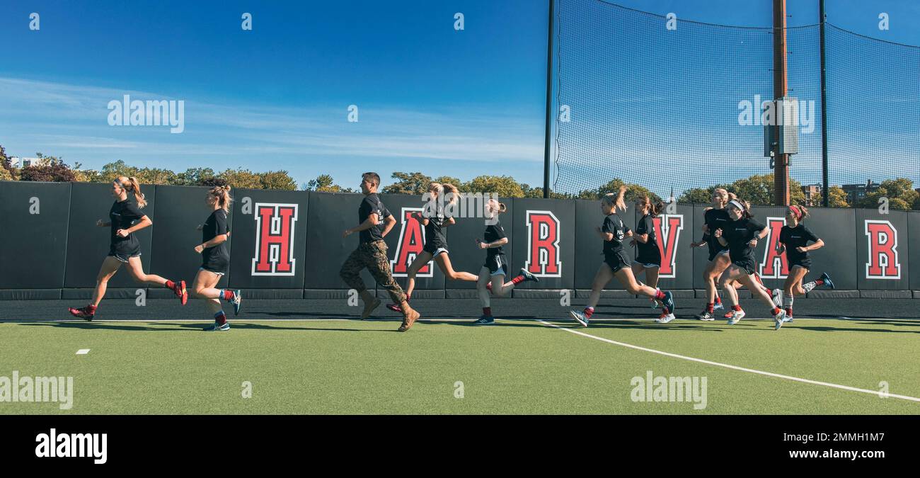 Harvard University field hockey team members participate in the 800 ...