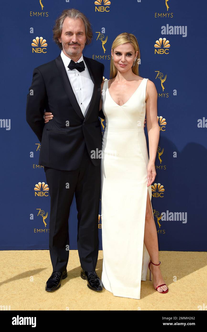 Peter Thum and Cara Buono arrive at the 70th Primetime Emmy Awards on Monday, Sept. 17, 2018, at ...