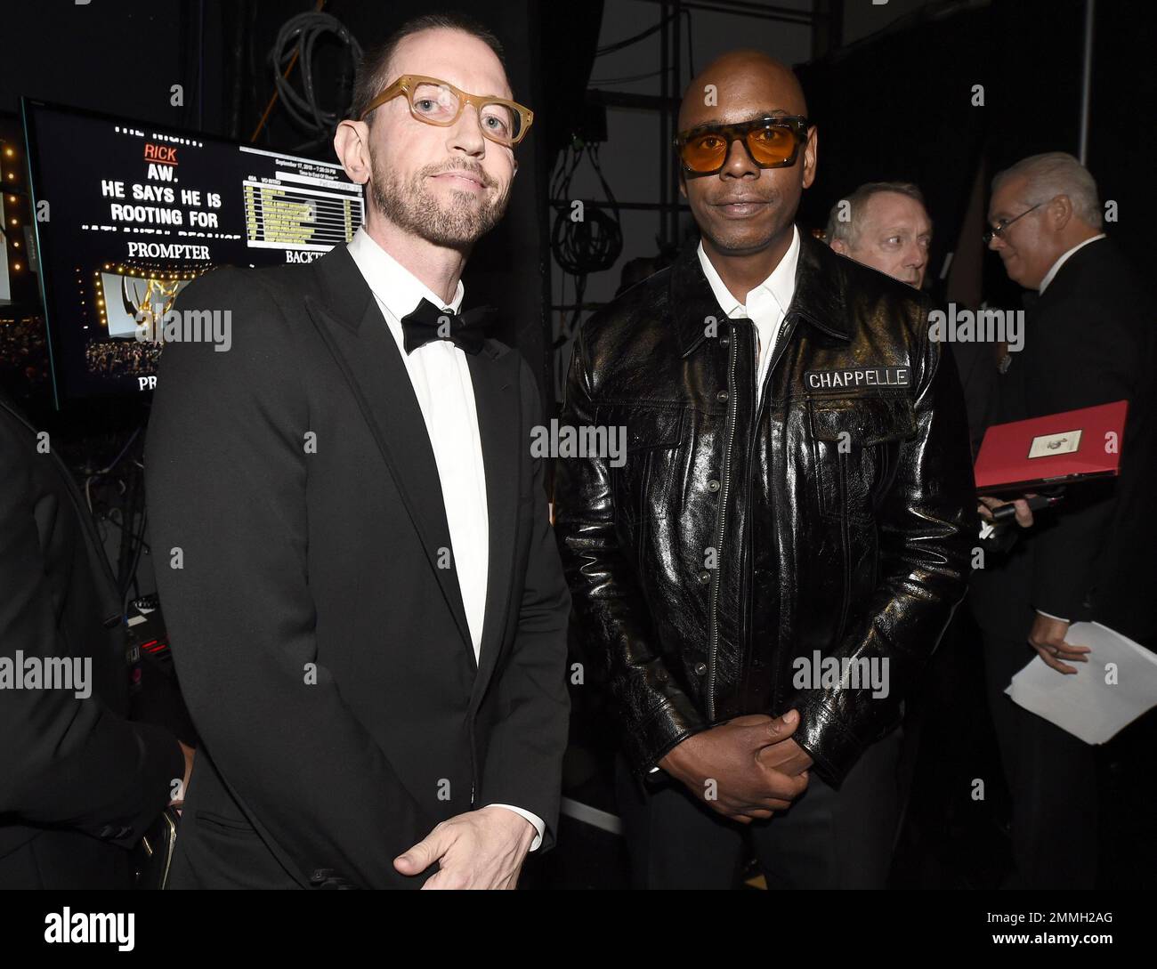 Neal Brennan, left, and Dave Chappelle pose backstage at the 70th ...